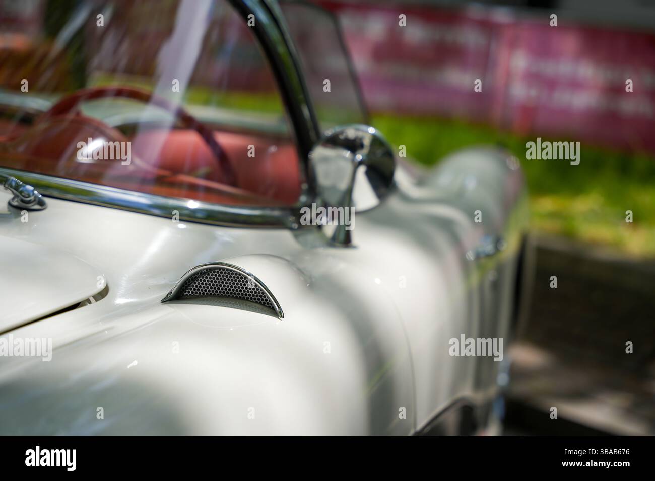 Cream-colored classic convertible with chrome details. Elegant cream ...