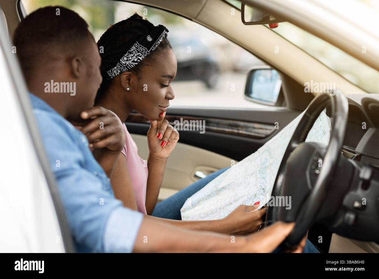 GPS, location, map, navigation concept. Confused young black family ...