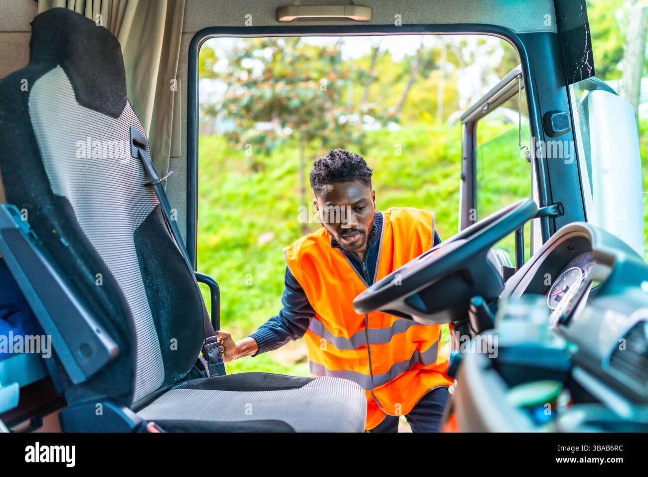 View from inside the vehicle of an african driver entering to a ...