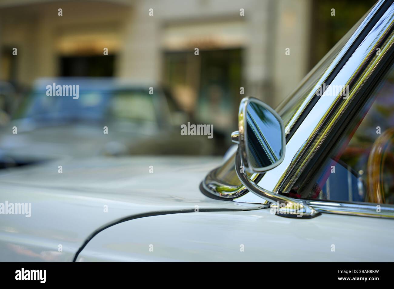 Reflected side view of a vintage car with an accent on the classic ...
