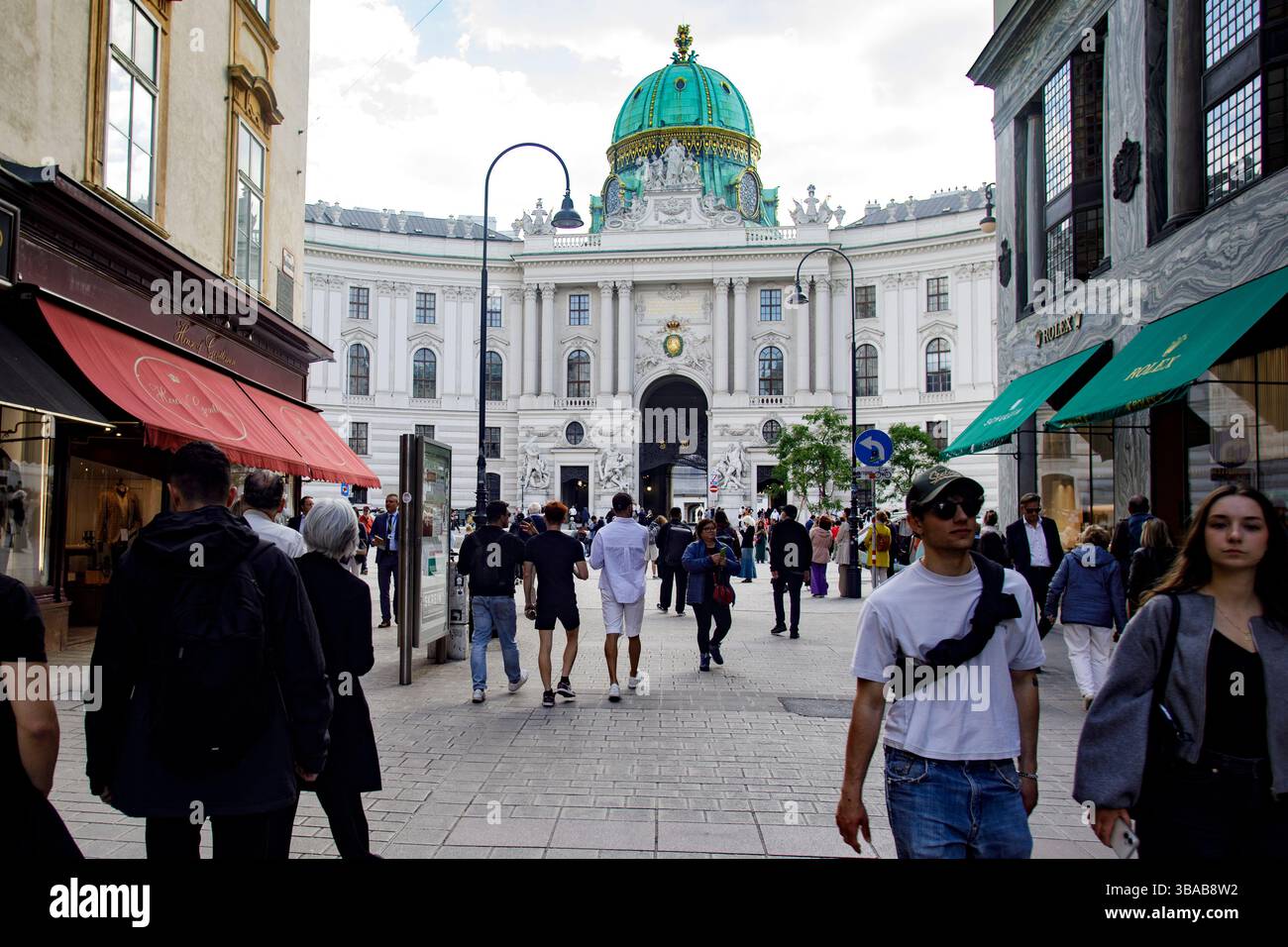 Vienna, Austria. 12th May, 2025. AUSTRIA; VIENNA; 20250512; People walk ...