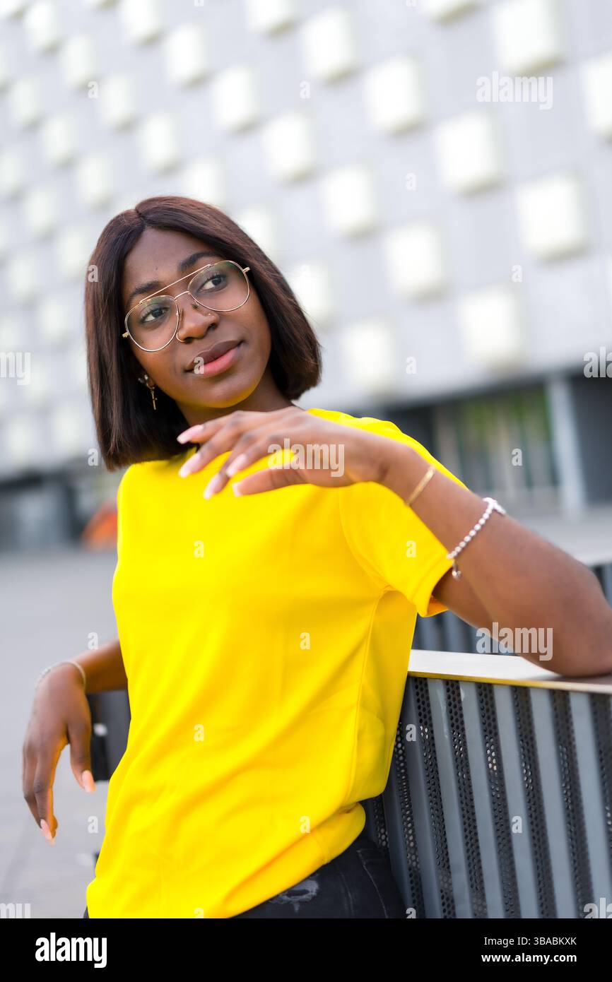 Modern Maven: A Young Black Model Stuns in Urban Fashion with a Smile ...