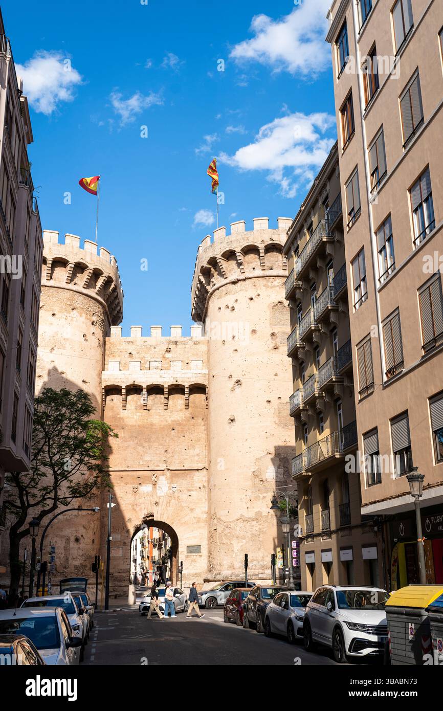 Ancient city gate of Valencia with historical marks of war damages ...