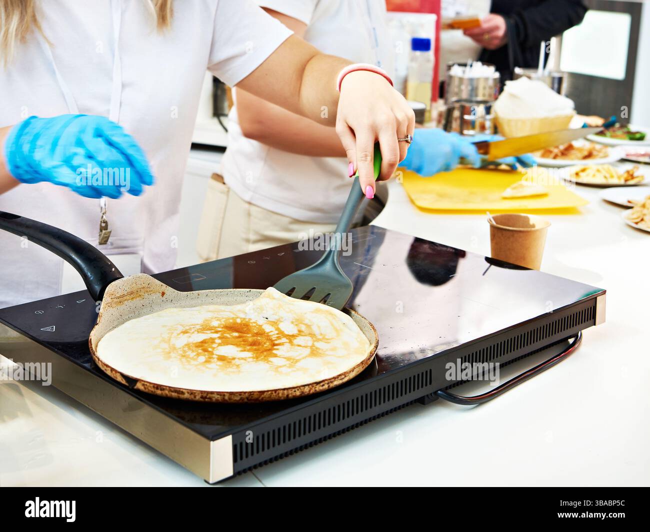 Pancake baking woman hi-res stock photography and images - Alamy