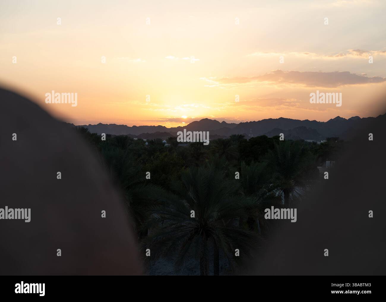 A breathtaking sunset view from Nizwa Fort, overlooking the ancient ...