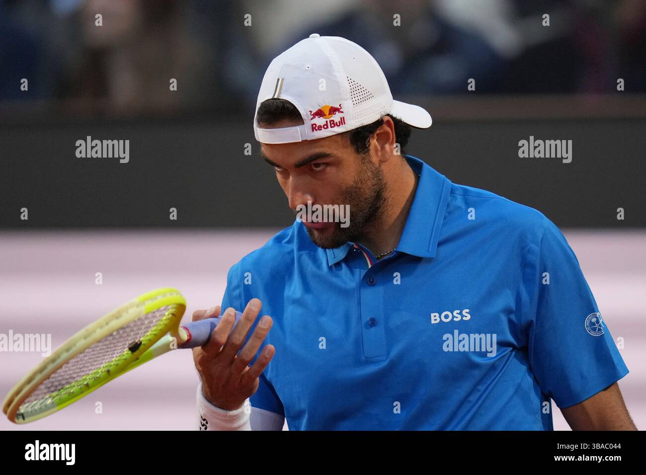 Italy's Matteo Berrettini reacts as he plays Norway's Casper Ruud ...