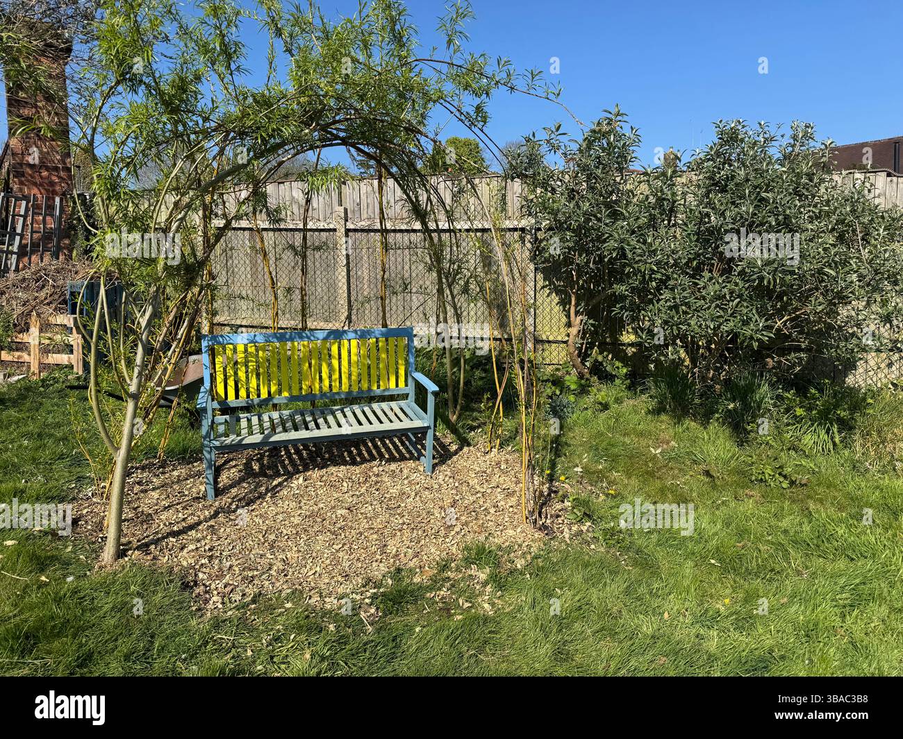 A colourful bench in Hannah Field community Garden Stock Photo - Alamy