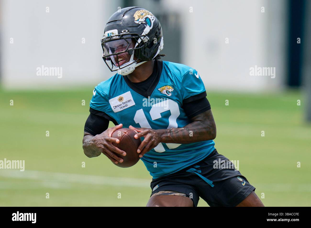Jacksonville Jaguars wide receiver Travis Hunter runs after a reception ...