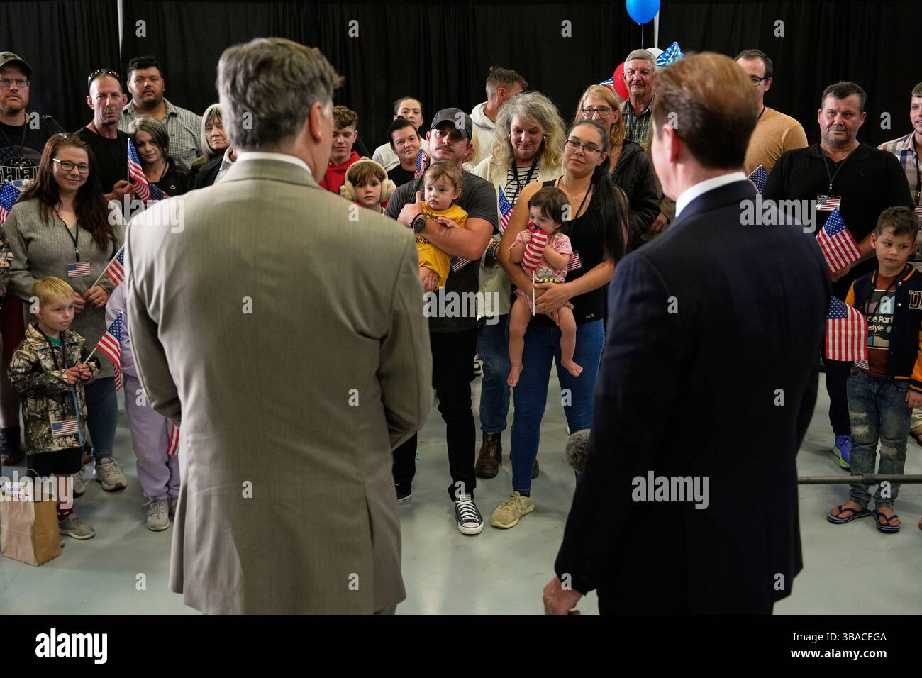 Deputy Secretary of State Christopher Landau, left, greets Afrikaner ...