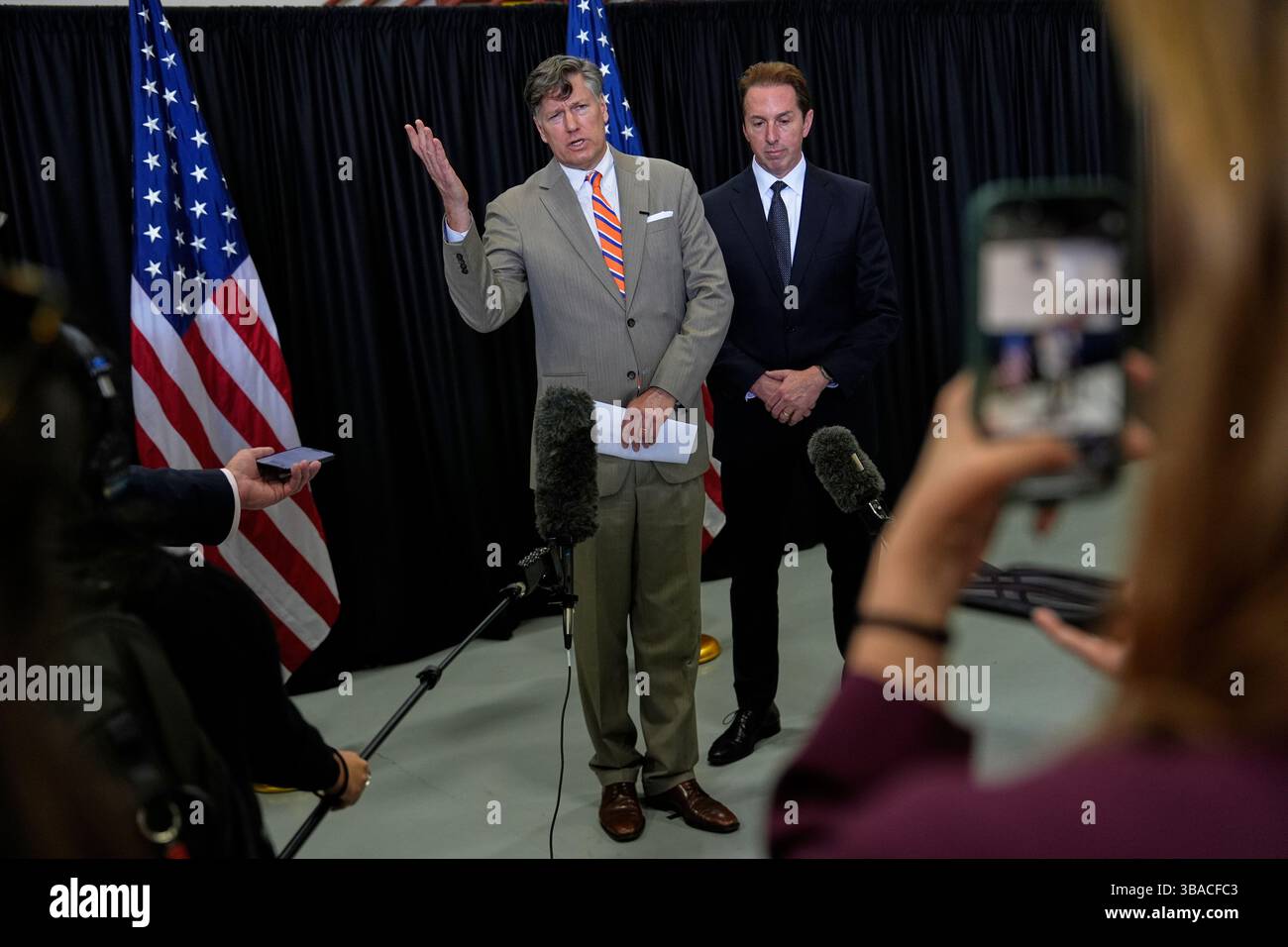 Deputy Secretary of State Christopher Landau, left, greets Afrikaner ...
