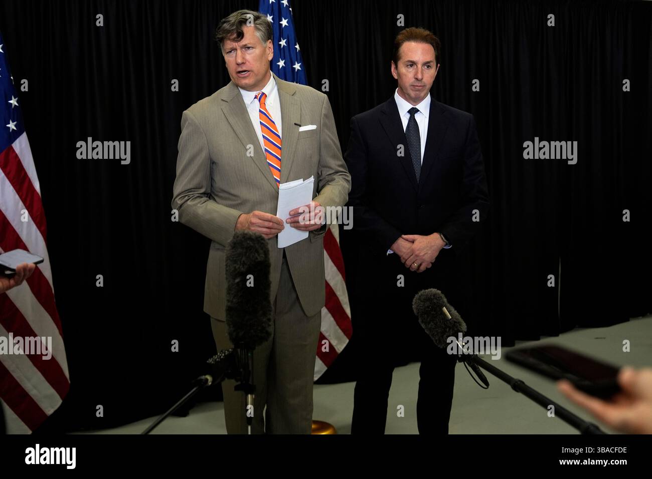 Deputy Secretary of State Christopher Landau, left, greets Afrikaner ...