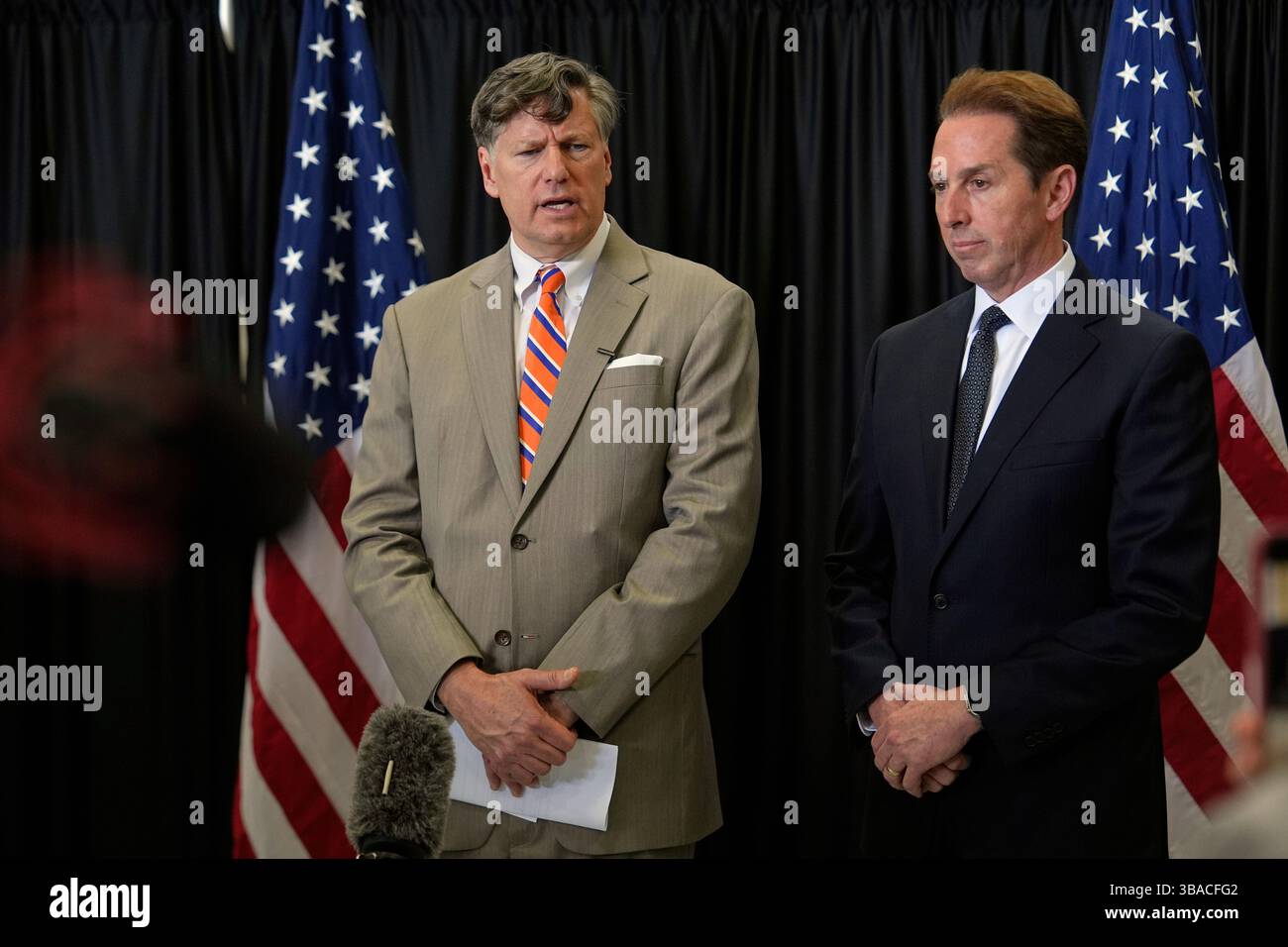 Deputy Secretary of State Christopher Landau, left, greets Afrikaner ...