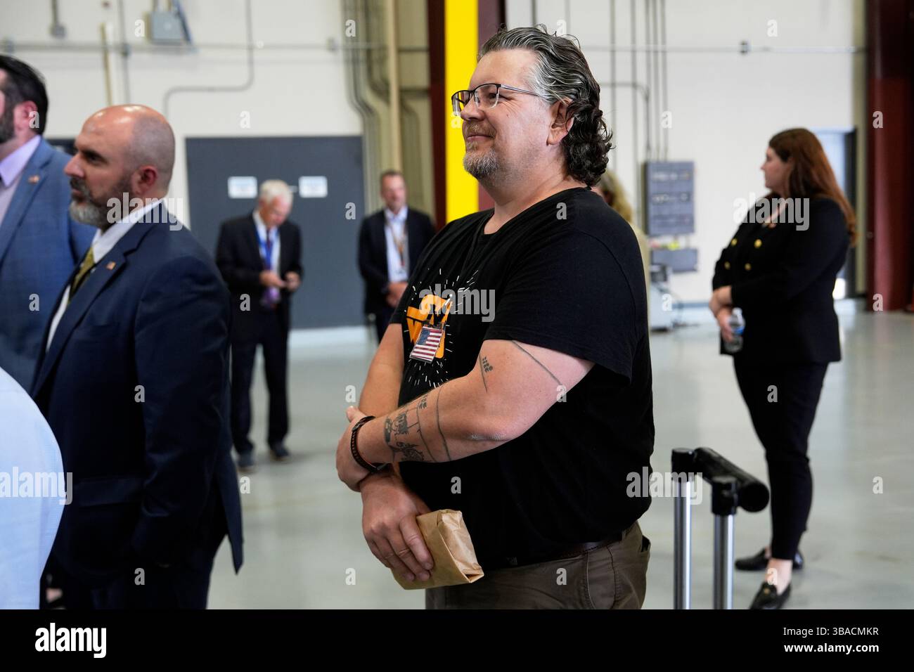 An Afrikaner refugees from South Africa listens as Deputy Secretary of ...