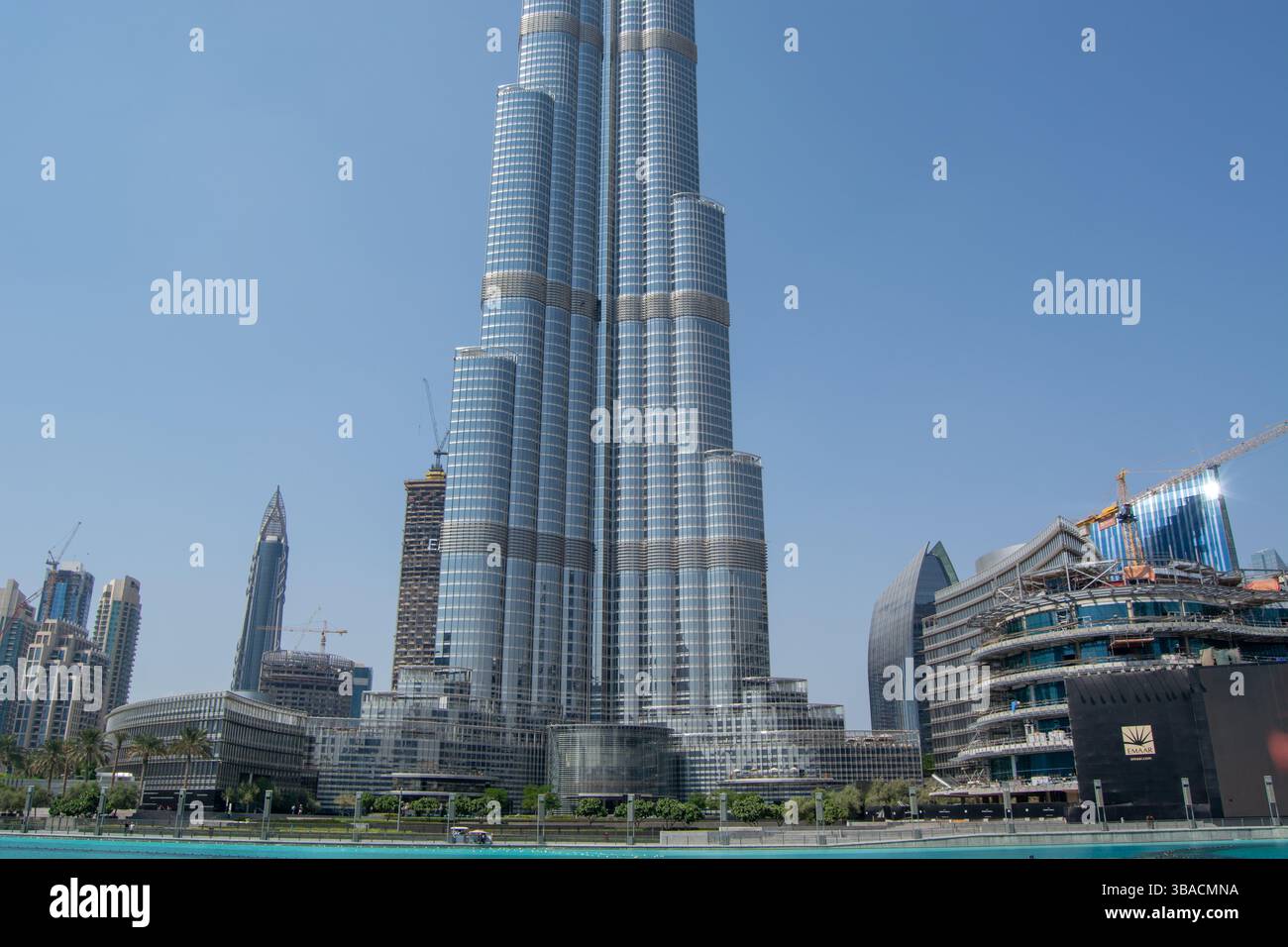 A stunning view of a modern skyscraper with a sleek glass facade ...