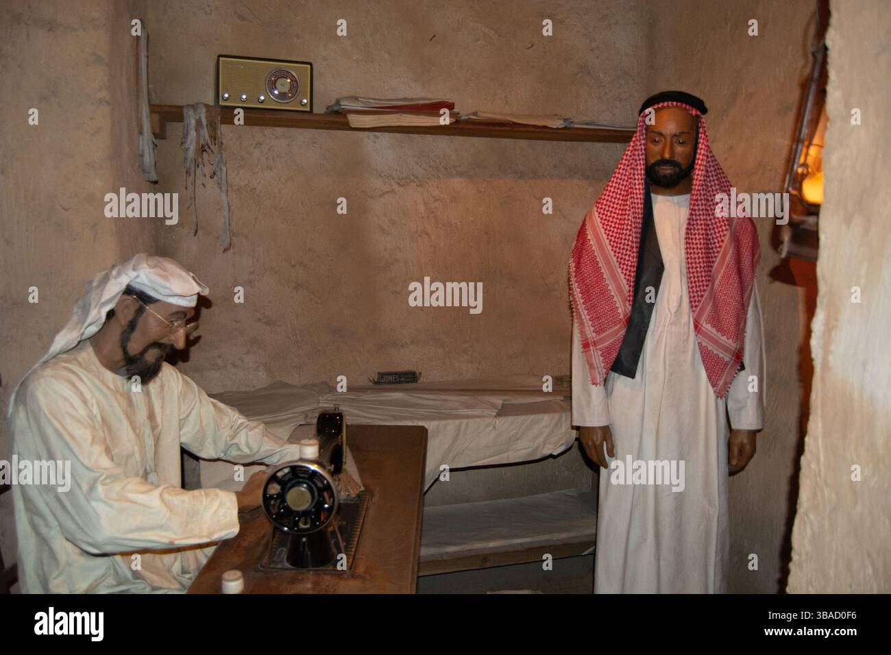 A historical diorama depicting two men in traditional Middle Eastern ...