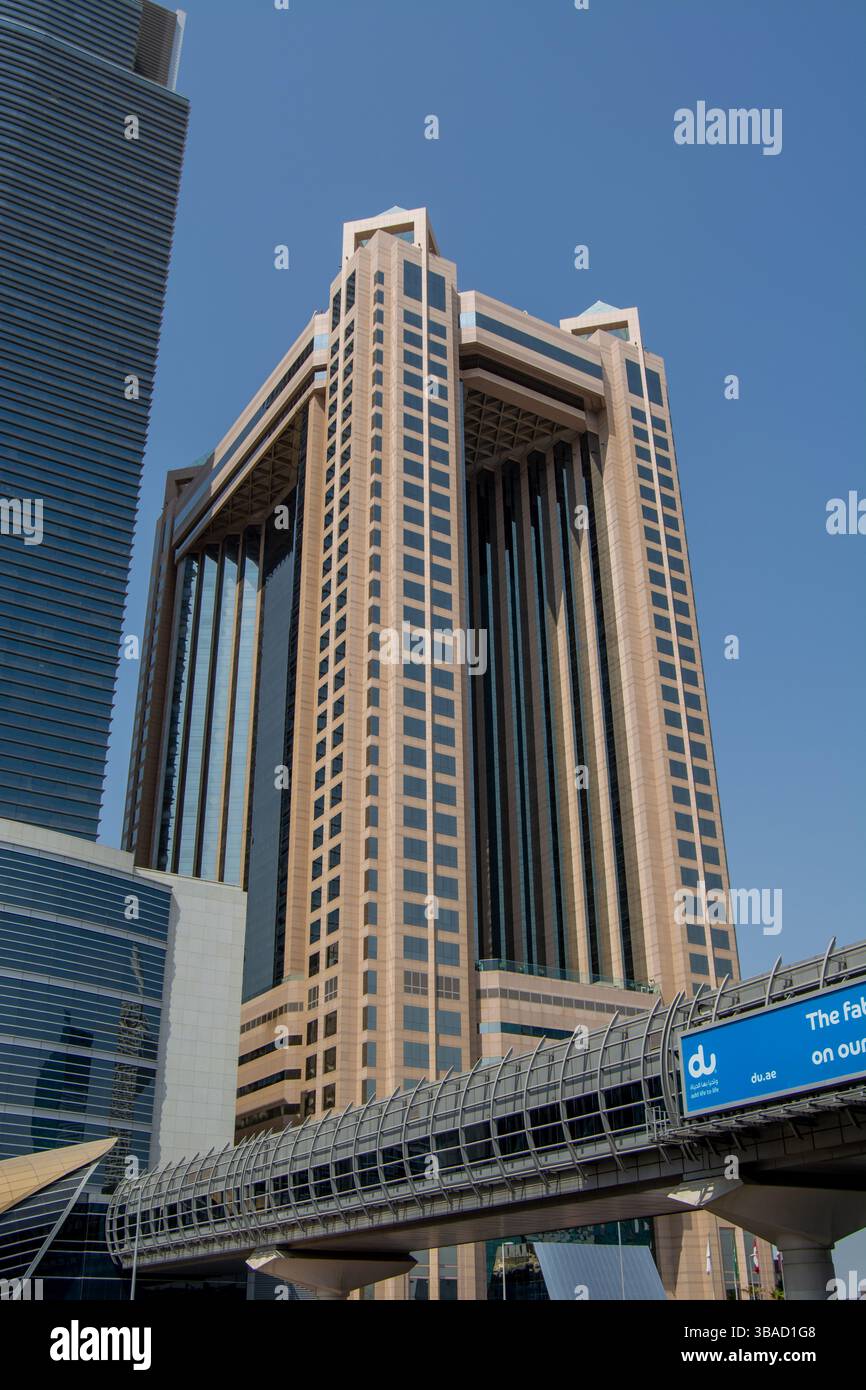 A modern skyscraper with a unique architectural design, featuring large ...