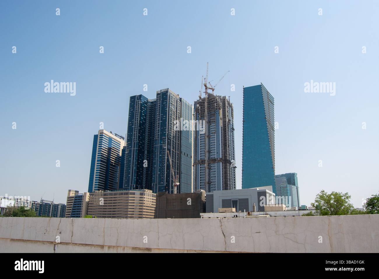 A skyline view featuring several modern skyscrapers, including a ...