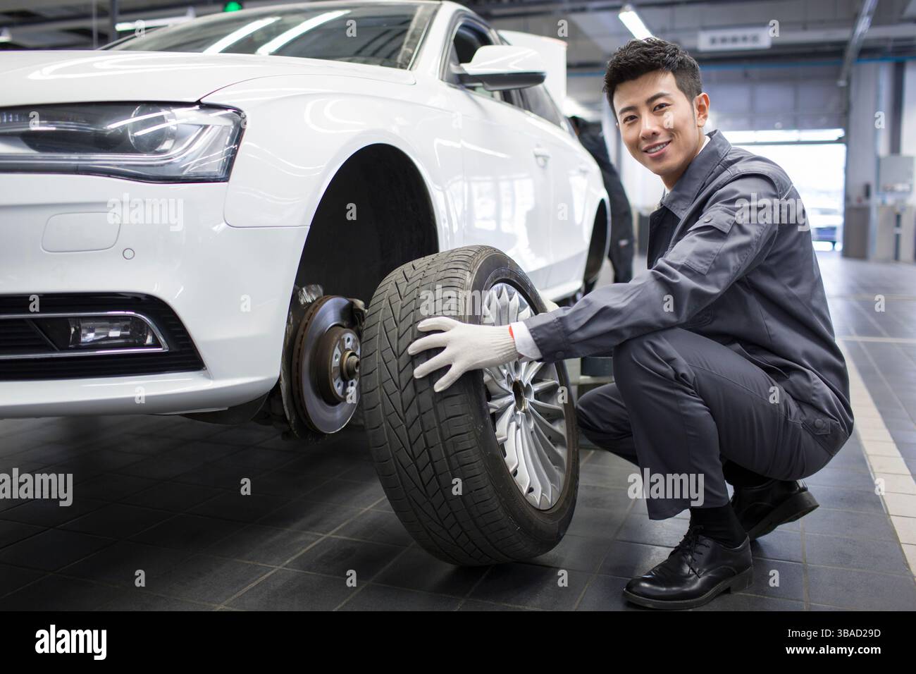 Chinese auto mechanic Stock Photo - Alamy