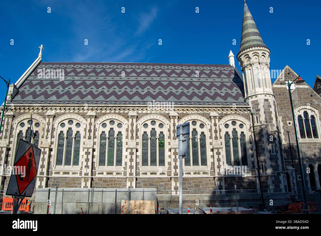 A historic stone church with intricate architecture, featuring tall ...