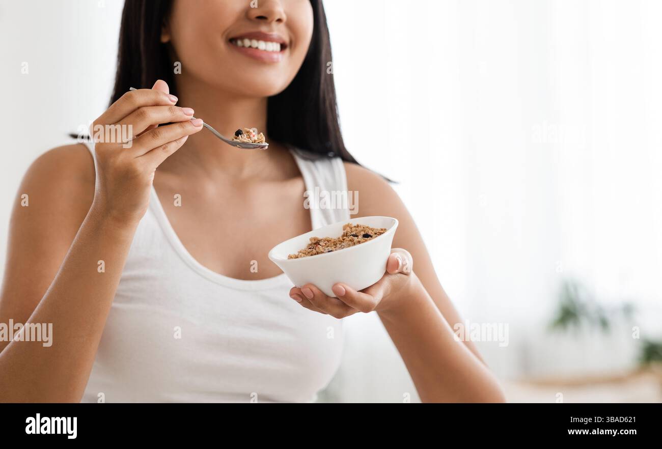Healthy food and nutrition concept. Cropped of Asian woman holding bowl ...