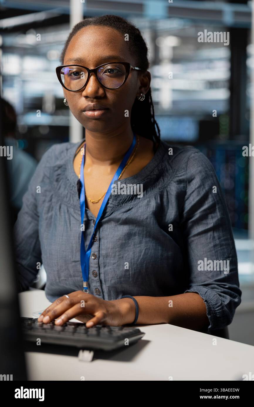 Data Center Worker Working To Update Server Rigs Software Configuring