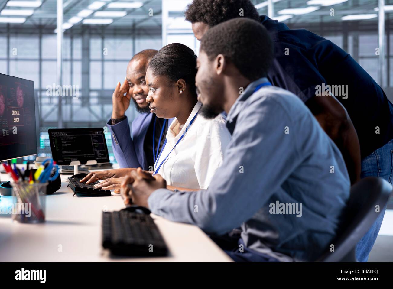 Team data center engineers investigate hi-res stock photography and images - Alamy