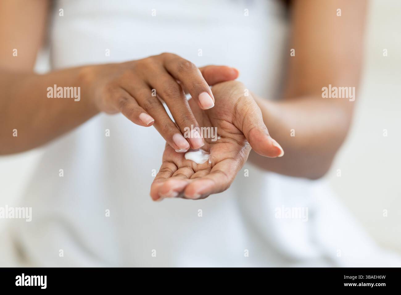Dry Skin Remedies. Unrecognizable African American Female Applying ...