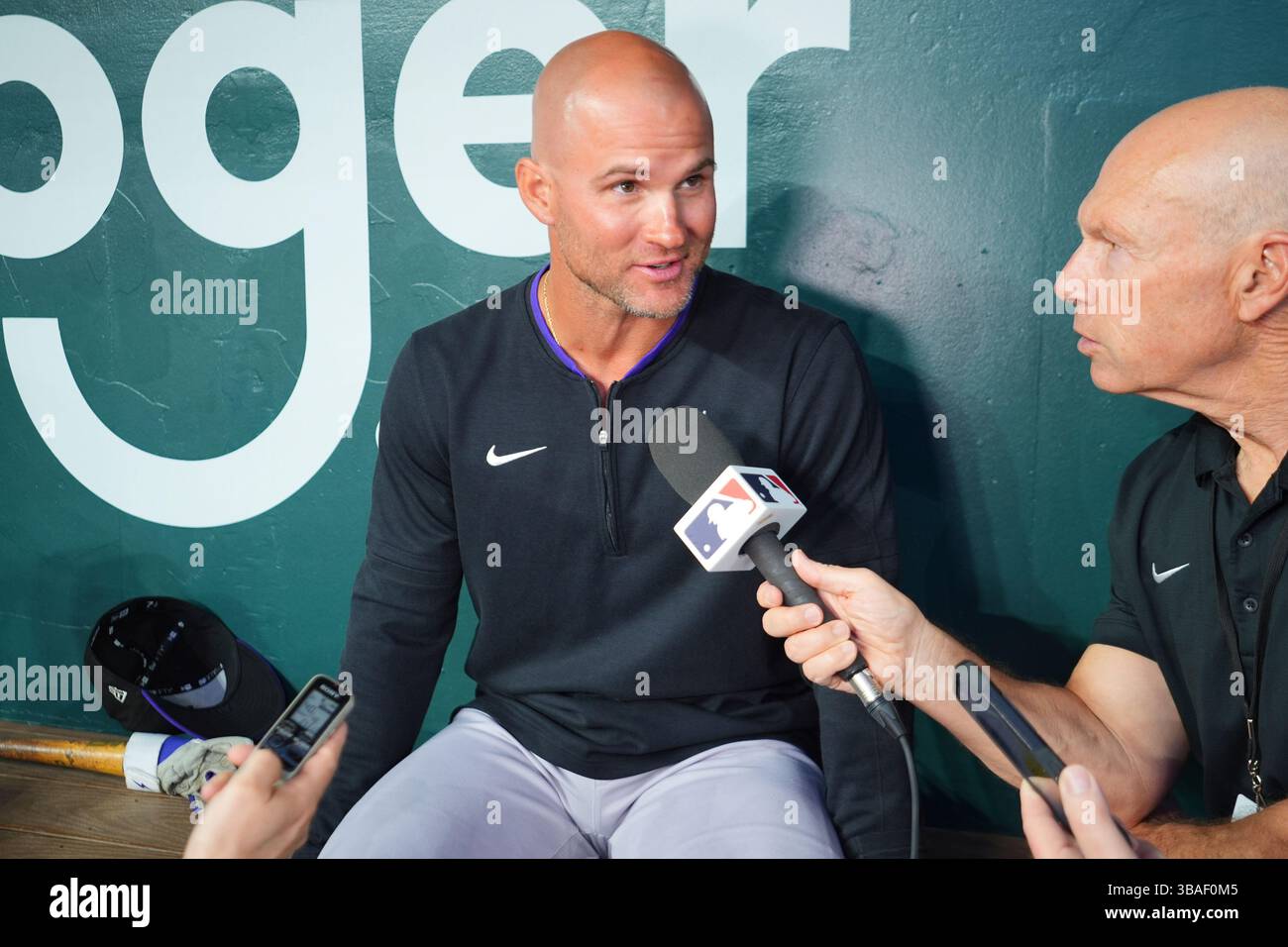 Colorado Rockies interim manager Warren Schaeffer, left, speaks in the ...