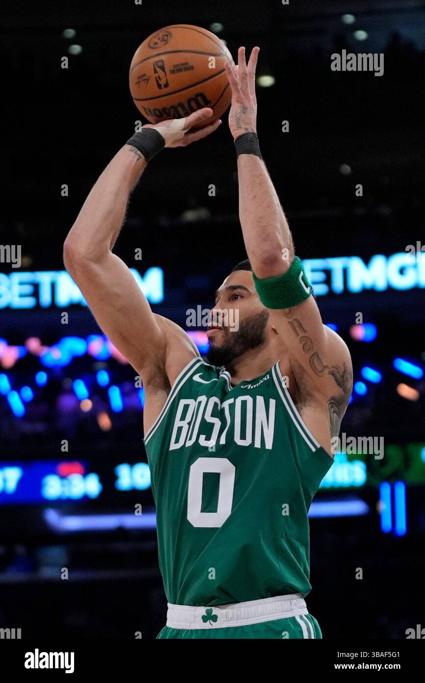 Boston Celtics' Jayson Tatum shoots the ball during the second half of ...