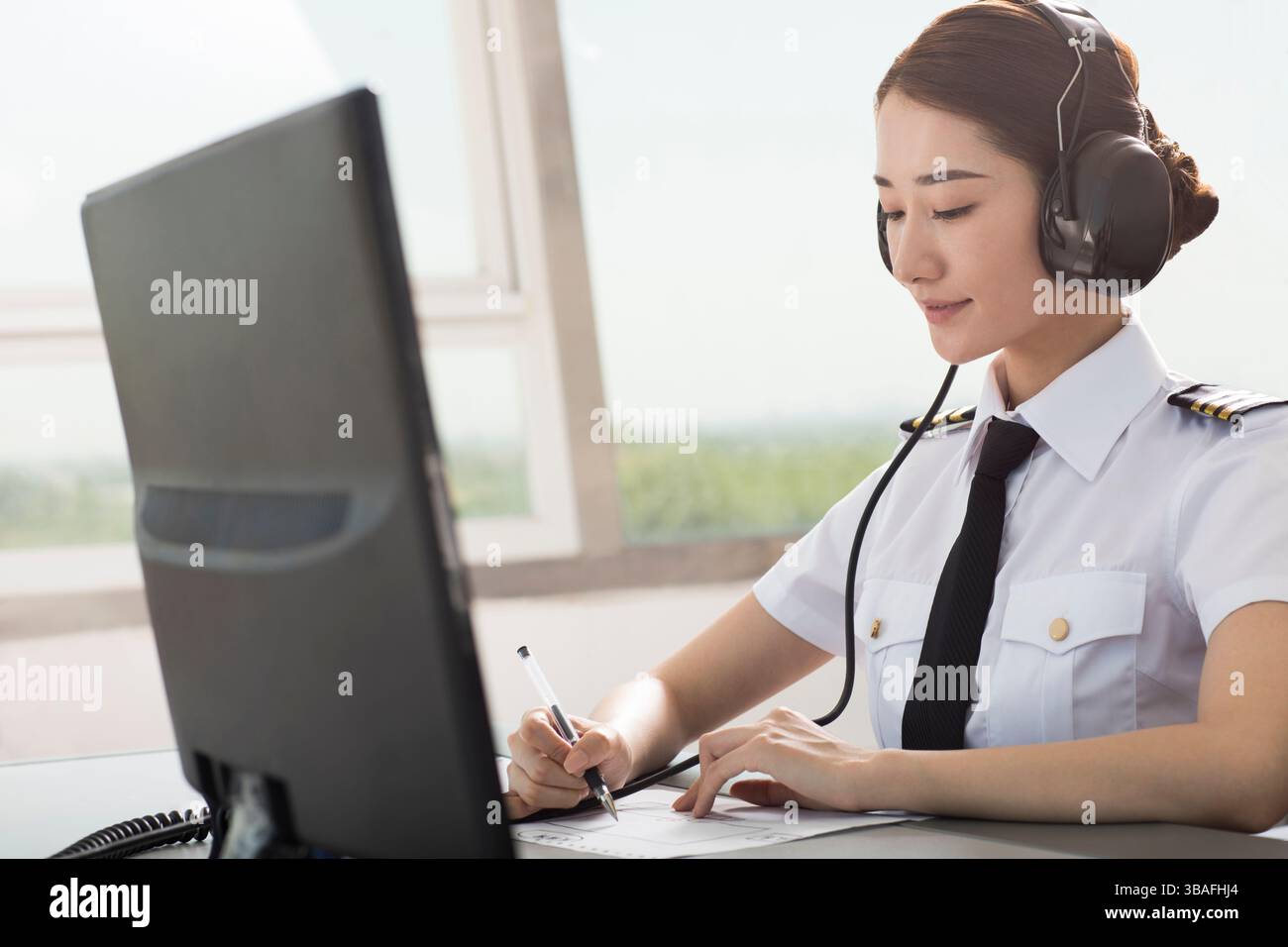 Chinese air traffic controller in tower Stock Photo - Alamy