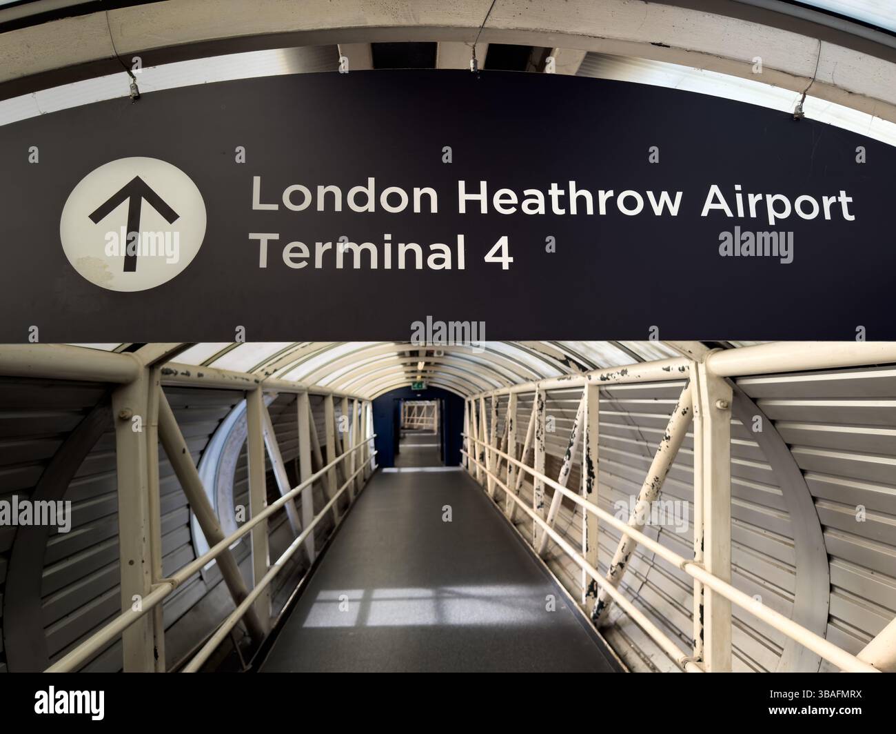 Sign with direction arrow to London Heathrow Airport Terminal 4 in ...