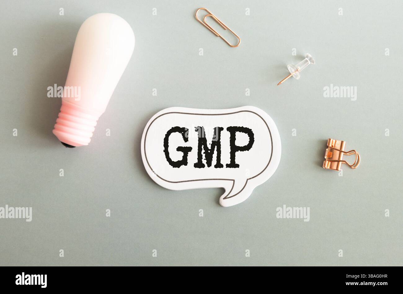 A coloured wooden cubes with text GMP. GMP stands for Good ...