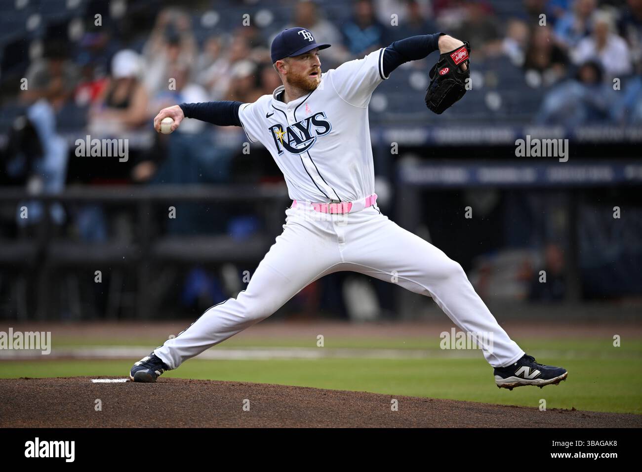 Tampa Bay Rays starting pitcher Drew Rasmussen throws to home plate ...