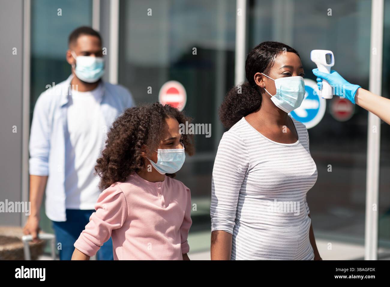 Body Temperature Control. Security guard using digital medical ...