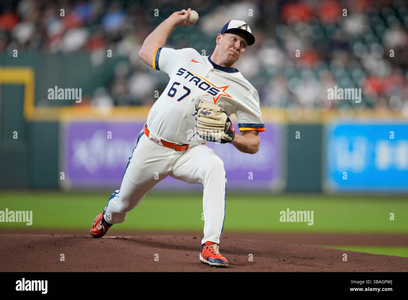 Houston Astros starting pitcher Ryan Gusto throws during the first ...