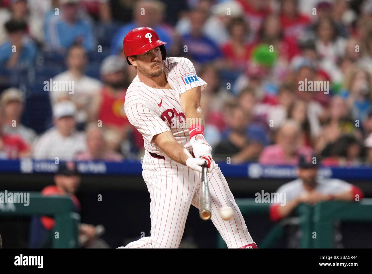 Philadelphia Phillies' J.T. Realmuto drives in a run on a fielder's ...