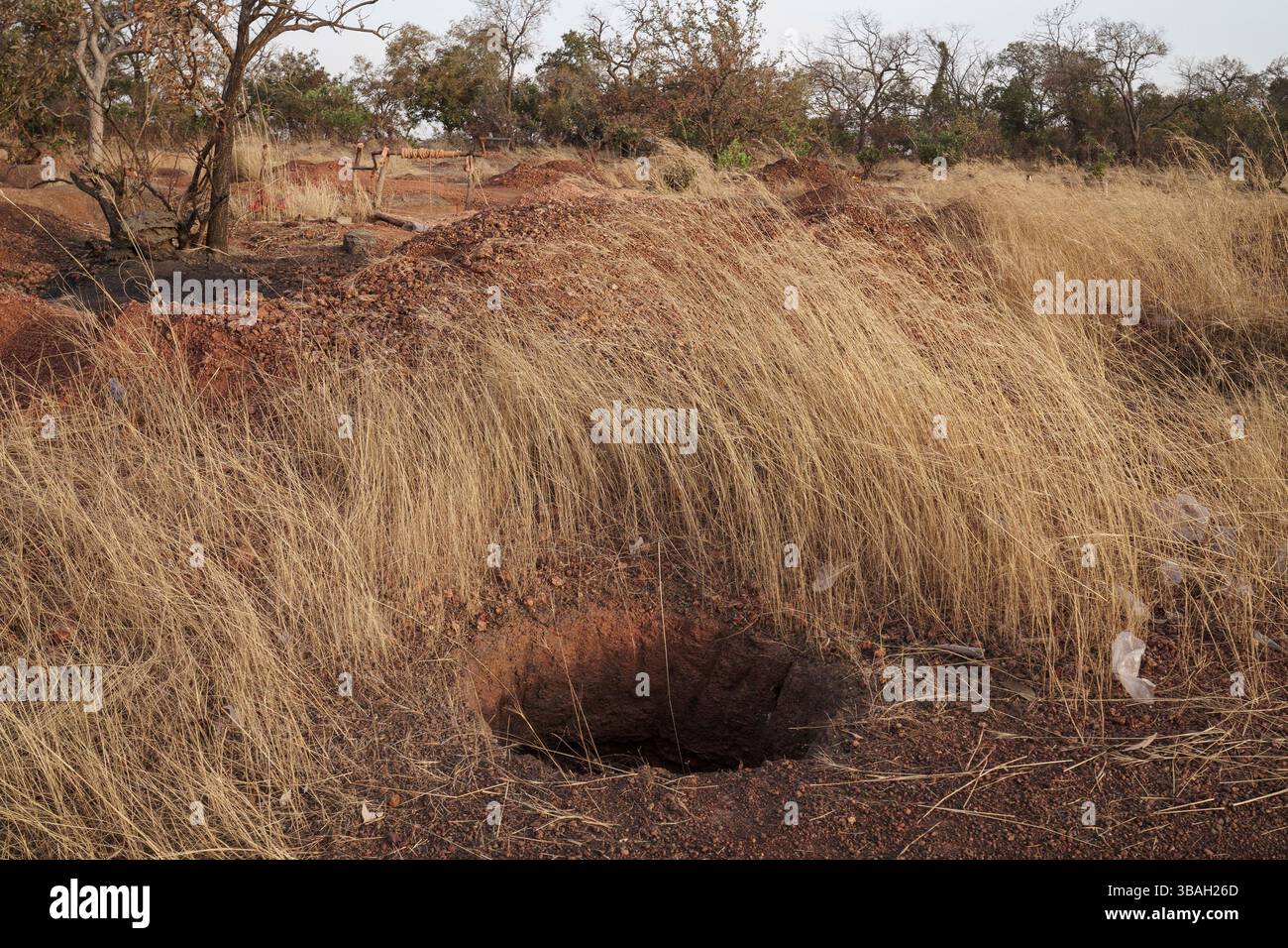 A mining pit sits open and unmarked at a gold mining site in the ...