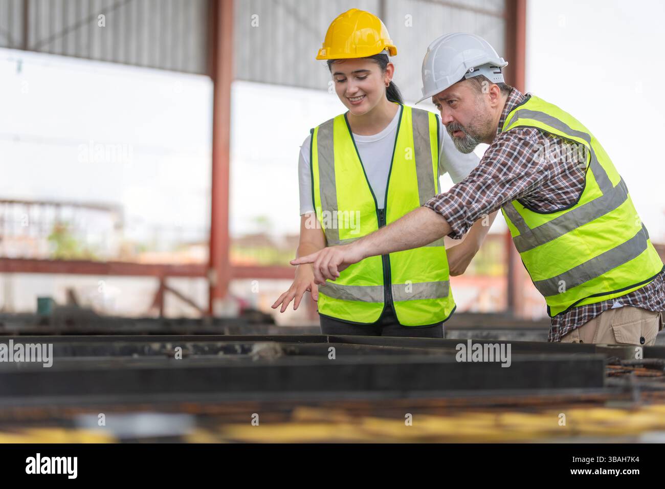 Site manager and builder inspect the construction site, Female foreman ...