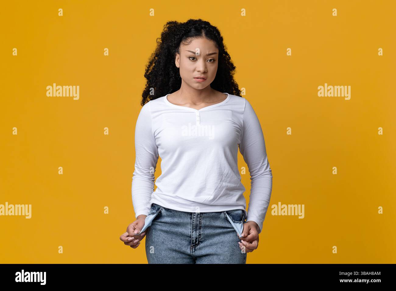 Poverty Concept. Portrait Of Upset Young Black Woman Showing Her Empty Pockets And Looking At ...