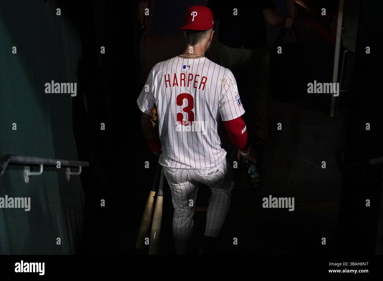 Philadelphia Phillies' Bryce Harper walks to the clubhouse after the ...