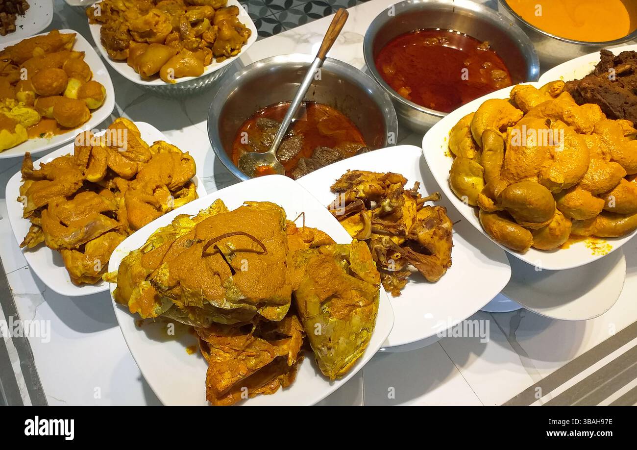 A selection of Padang dishes Minangkabau cuisine from West Sumatra in ...