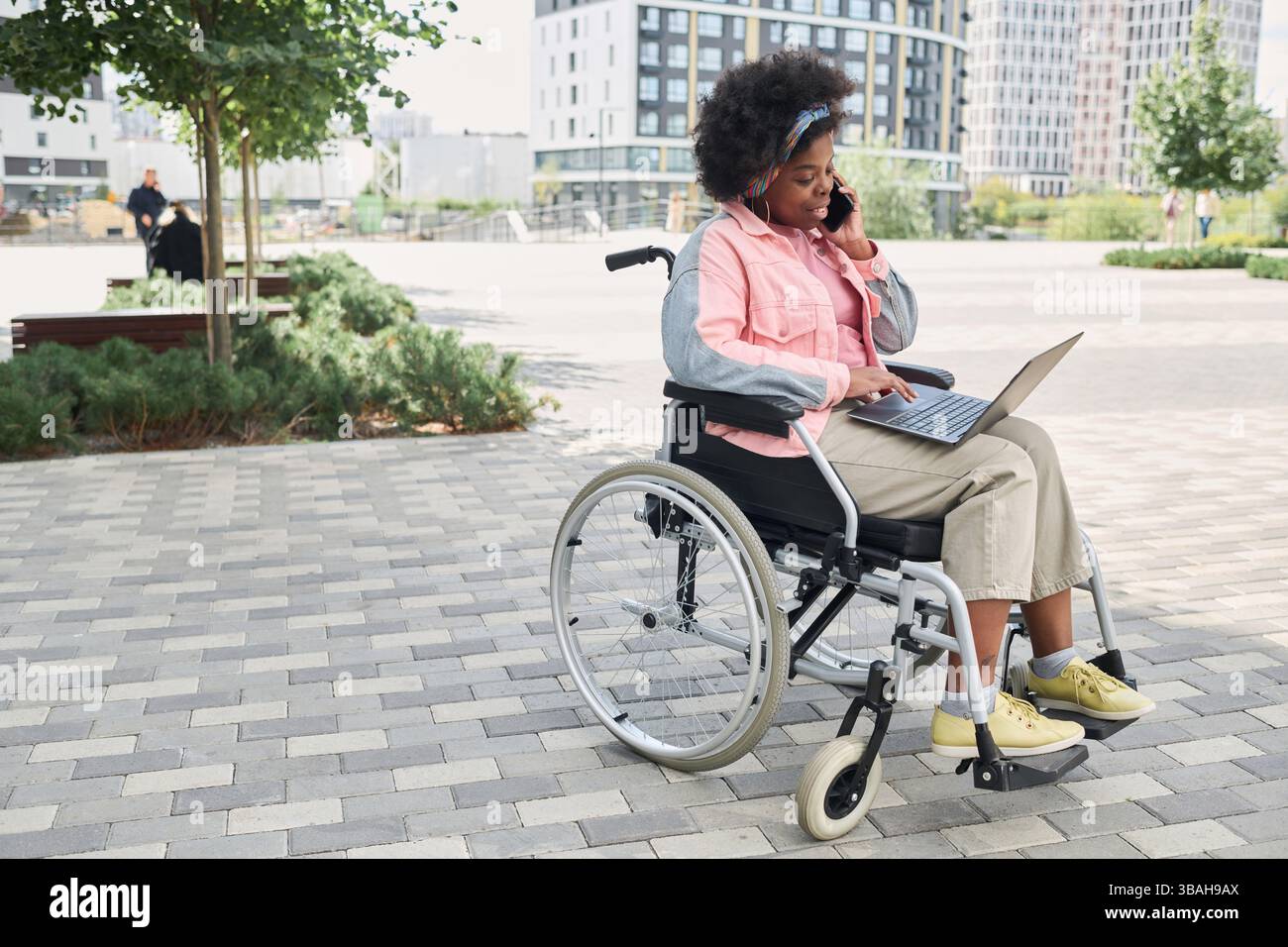 African American young woman with disability having conversation on the ...