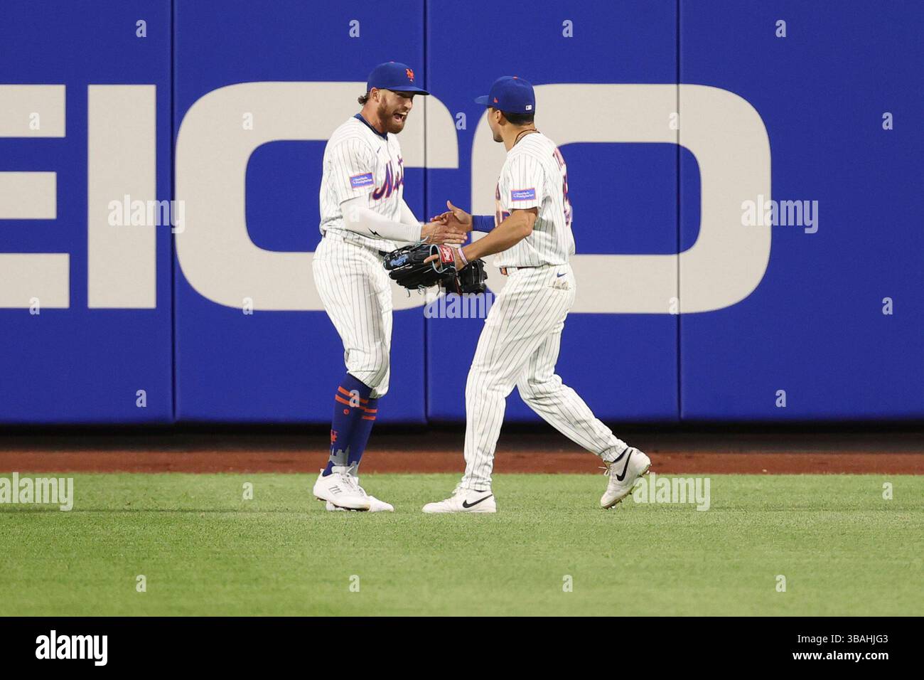 New York Mets outfielder Brandon Nimmo, left, reacts with outfielder ...