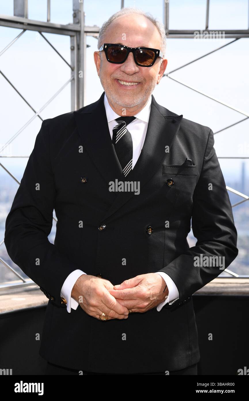 (L-R) Emilio Estefan Jr. visits the Empire State Building to celebrate ...