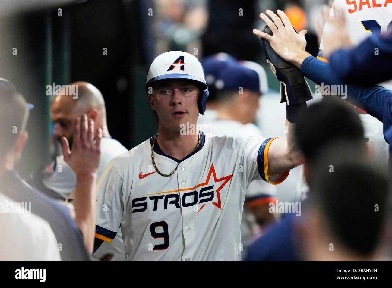Houston Astros' Zach Dezenzo celebrates after scoring off of sacrifice ...