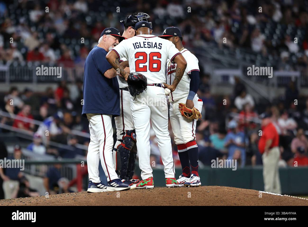 ATLANTA, GA - MAY 12: Rick Kranitz #39 of the Atlanta Braves confers ...