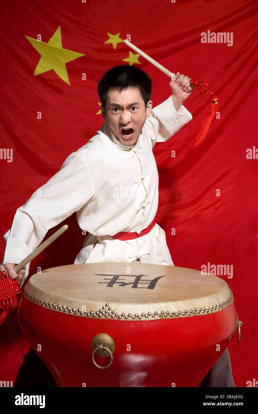 Young Chinese Man Playing A Traditional Chinese Drum Stock Photo - Alamy