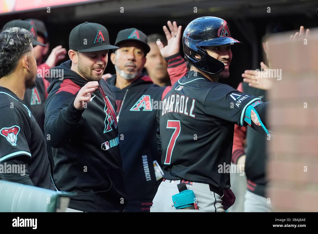 Arizona Diamondbacks' Corbin Carroll (7) is congratulated by teammates ...