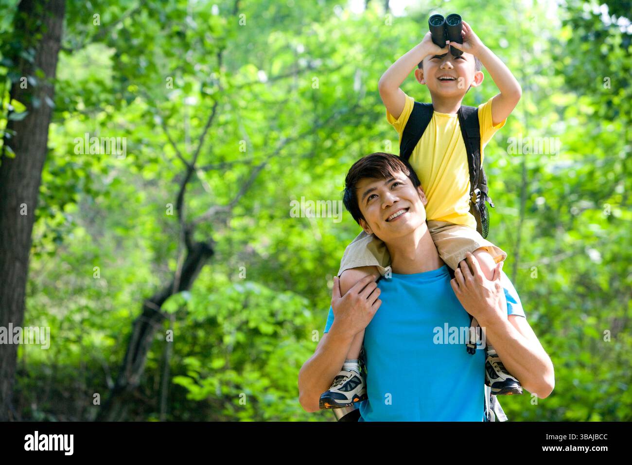 Chinese father and son in the great outdoors Stock Photo - Alamy