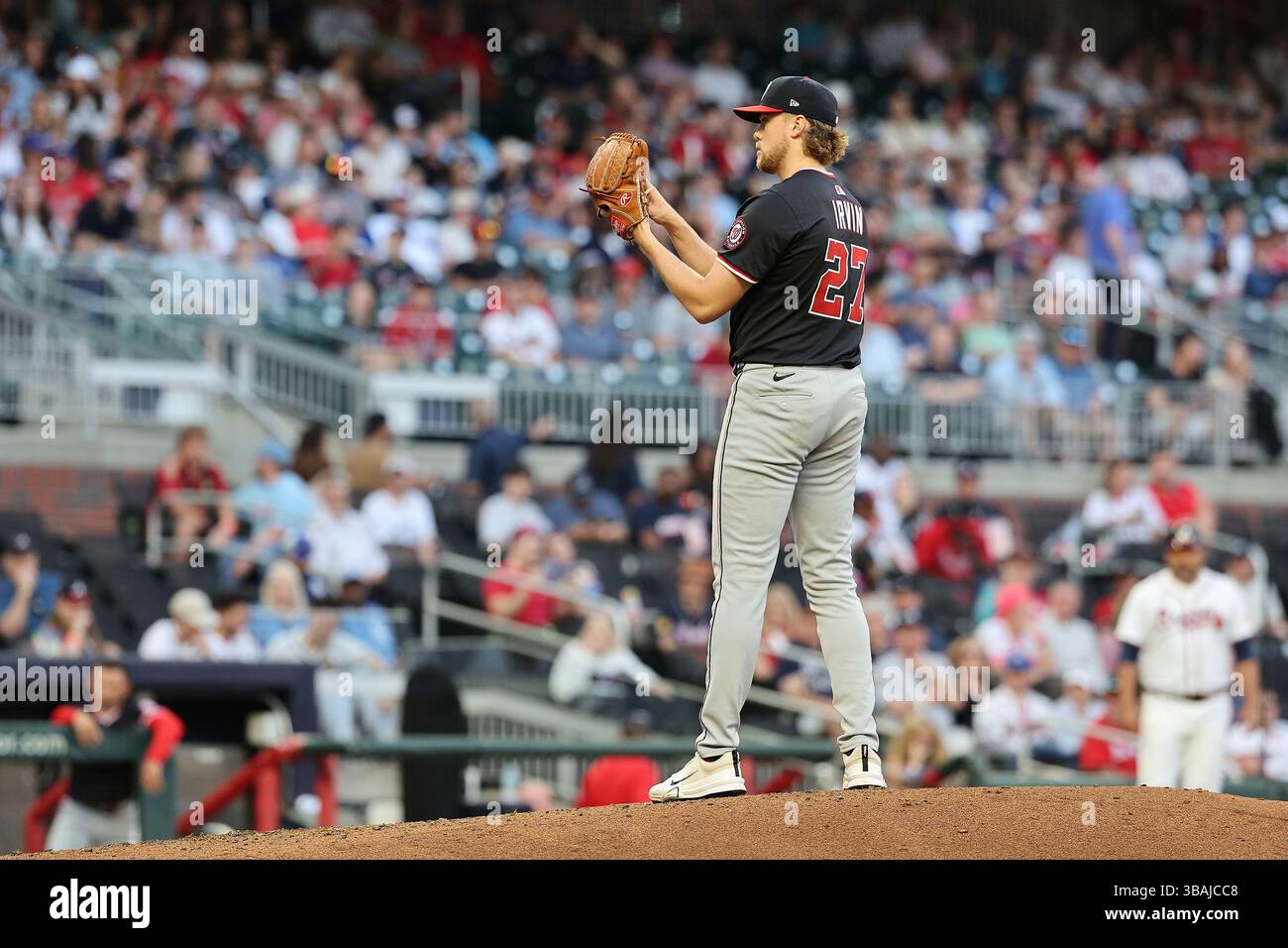 ATLANTA, GA - MAY 12: Jake Irvin (27) of the Washington Nationals ...